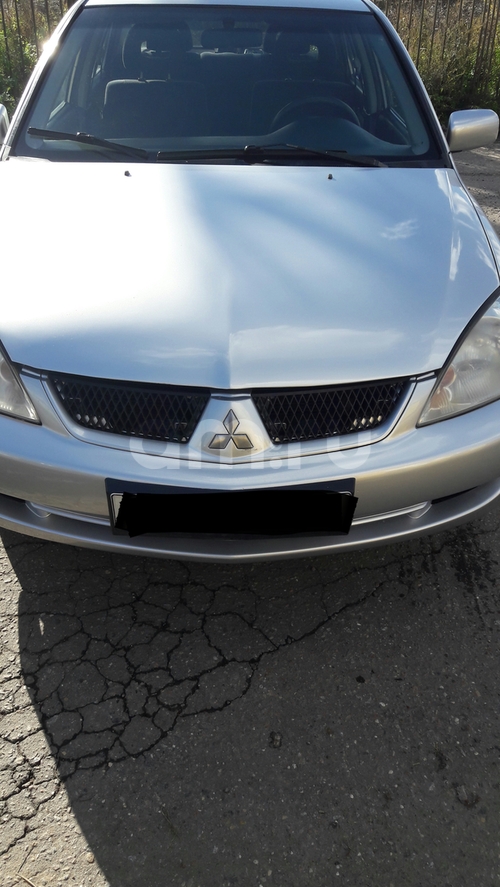 Mitsubishi Lancer '2006, IX [2-й рестайлинг]